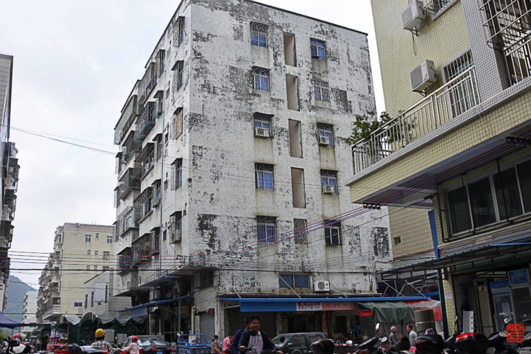 An Older Building Across From a Newer One | The Taishan Project